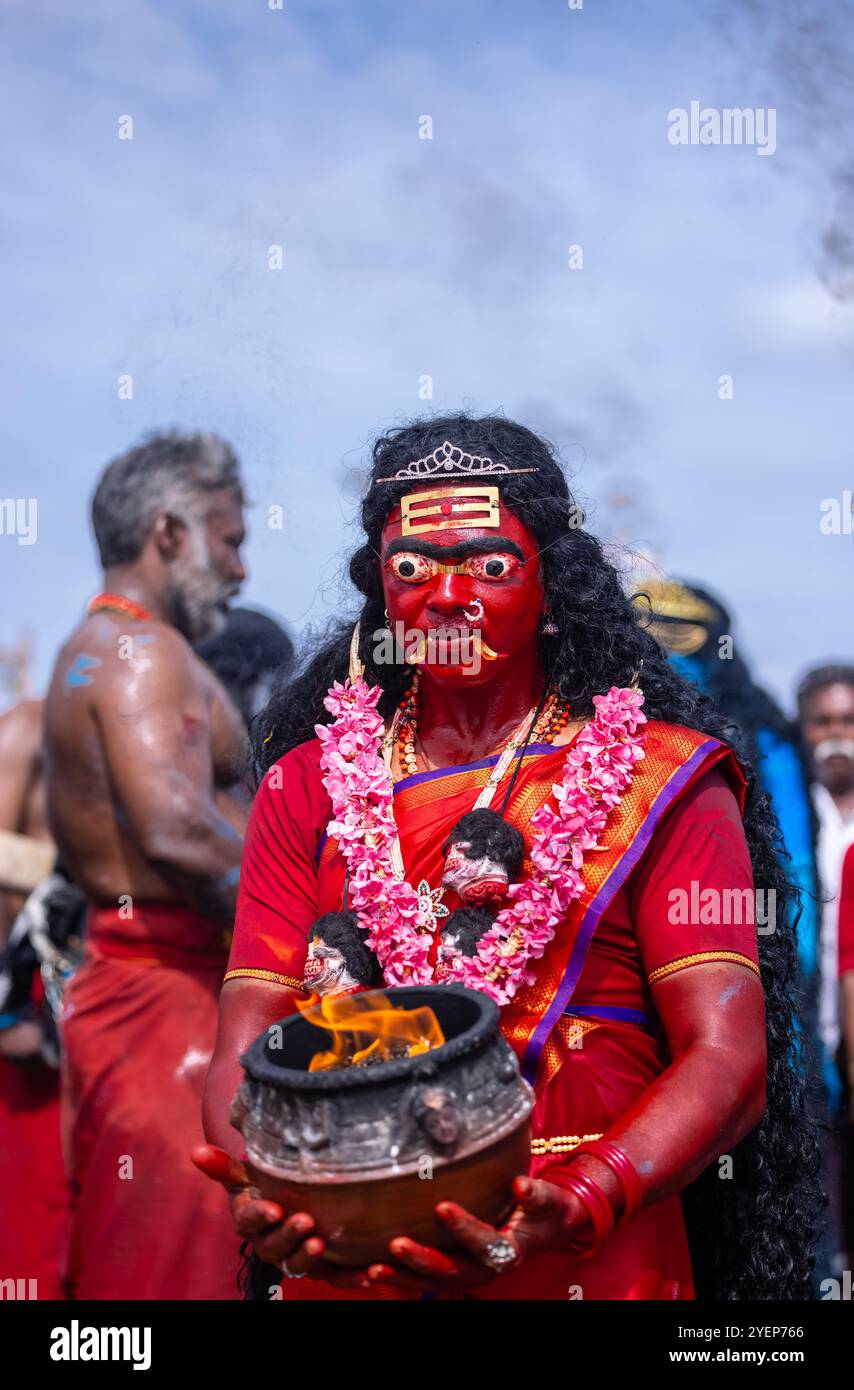 Kulasai Dasara, Portrait of indian hindu devotee with painted face and ...