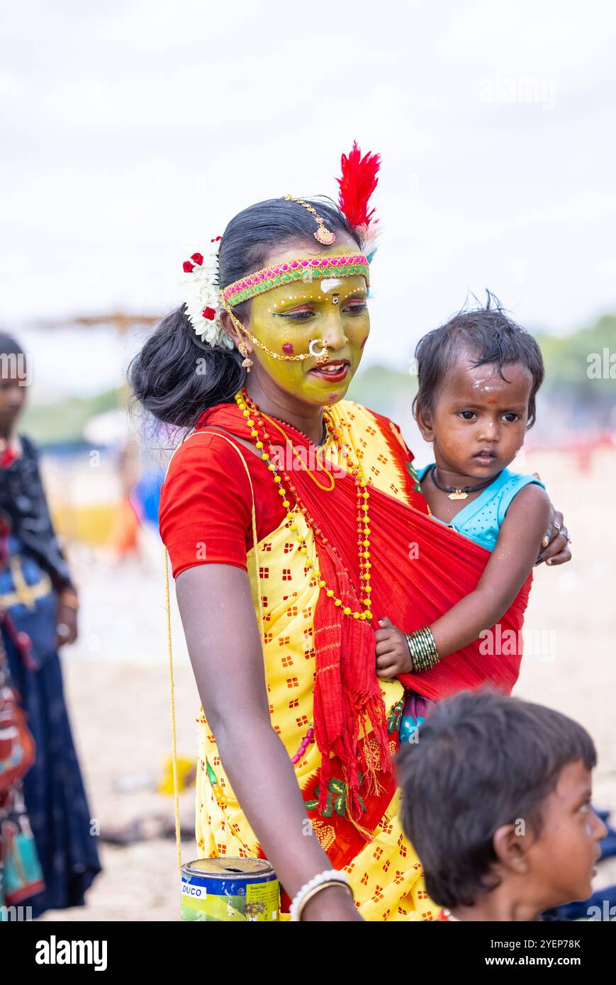 Kulasai Dasara, Portrait of indian hindu devotee with painted face and ...