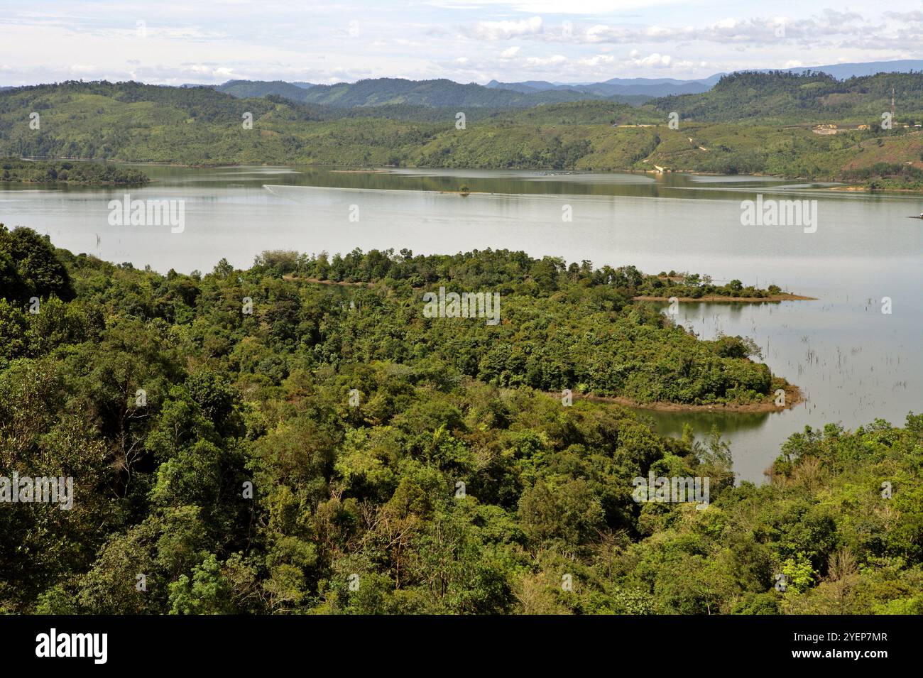 Landscape of Kampar River with hills and forest on its banks is ...