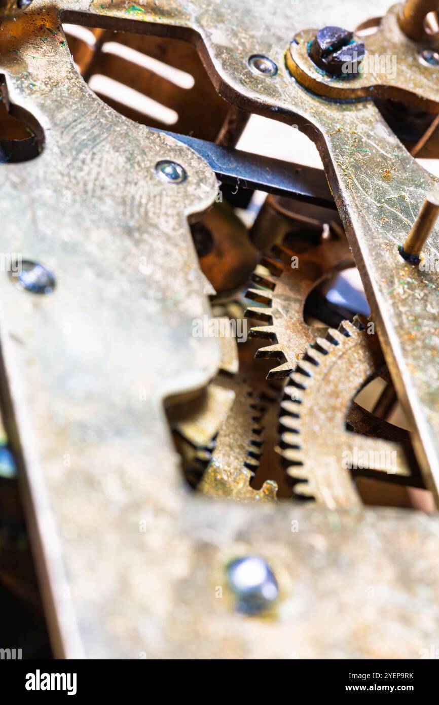 Mechanical watch movement with interconnected, worn gears showing ...