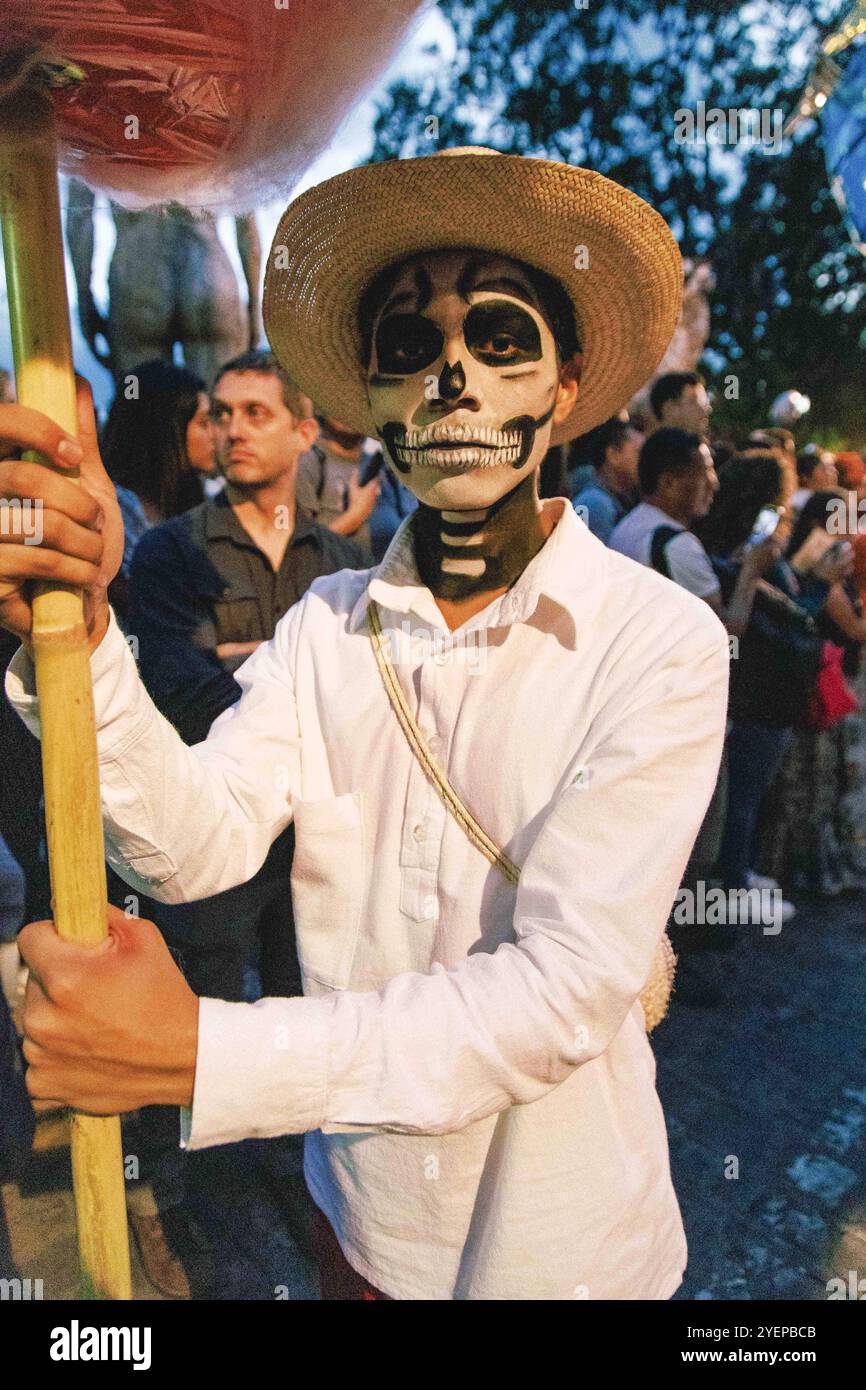 Dia de Muertos Parade in Oaxaca A boy whit his face painted as skull ...