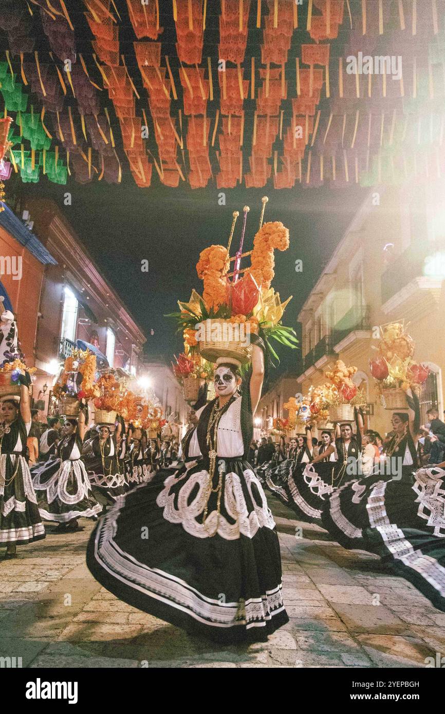 Dia de Muertos Parade in Oaxaca A woman wearing a traditional Mexican ...