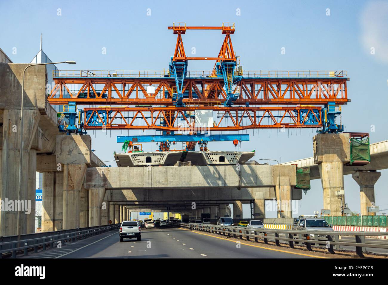 A construction of elevated precast segmental bridge over highway in ...