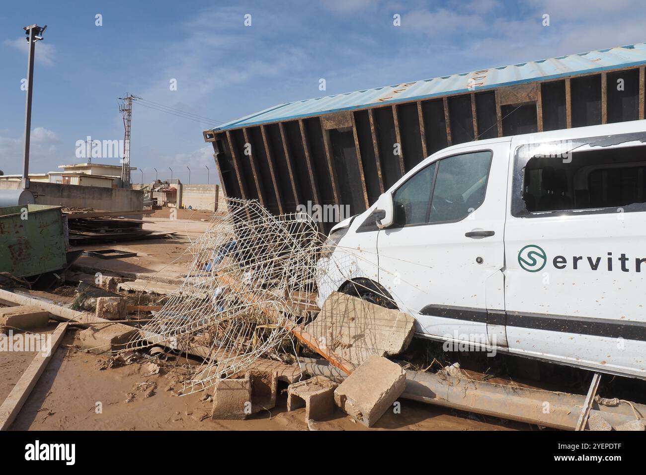 The aftermath of hurricane Dana in Valencia, Spain - A damaged van and ...