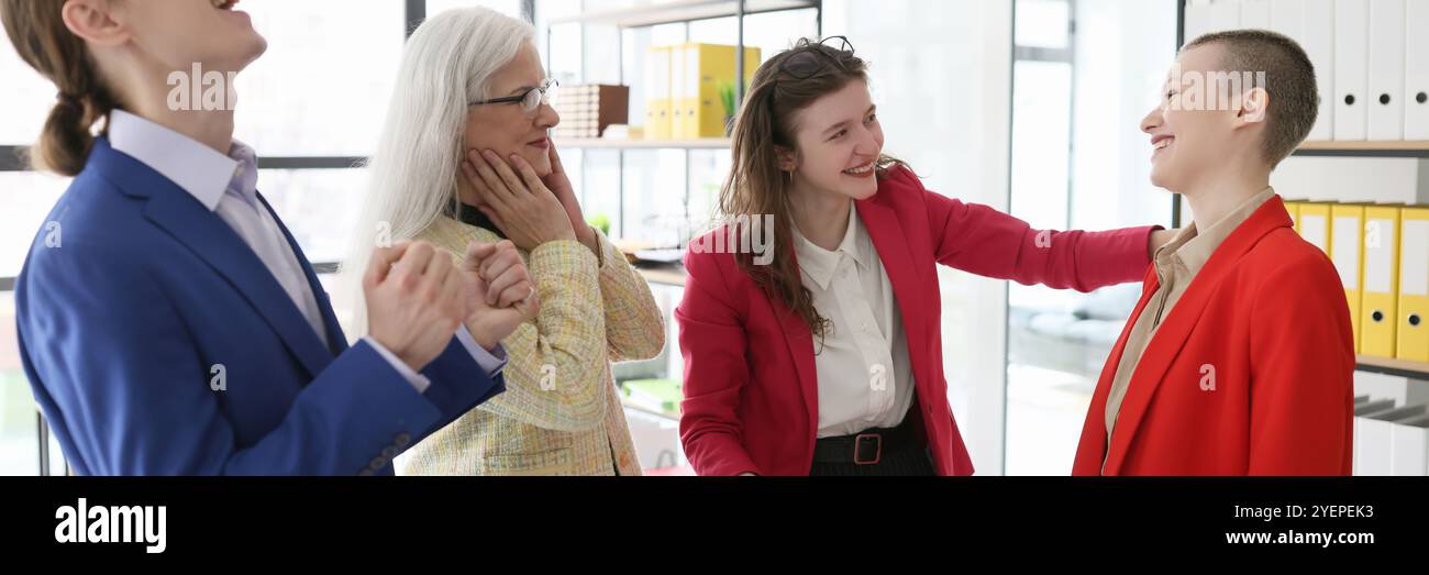 Office staff congratulate colleague hi-res stock photography and images ...