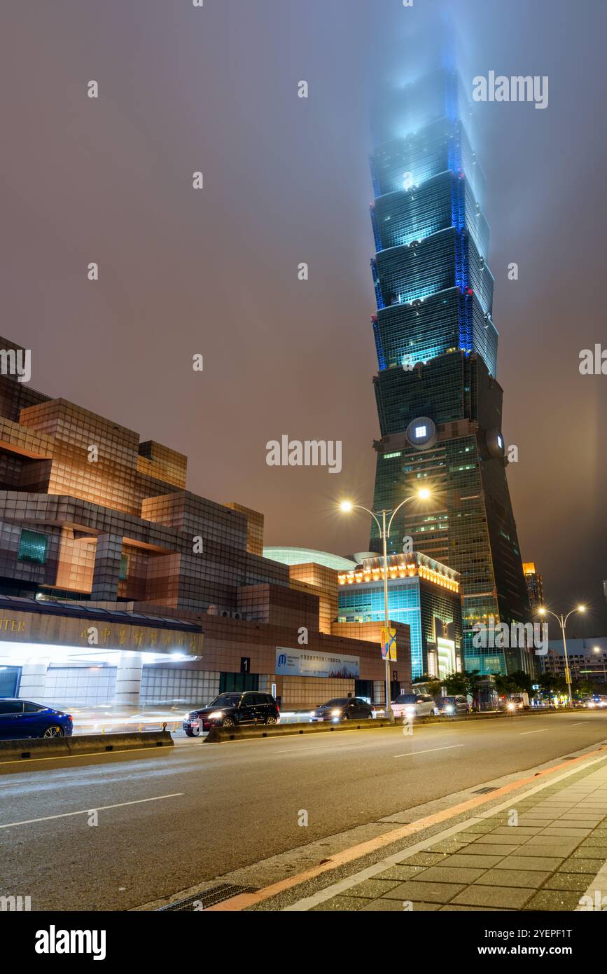 Awesome night view of Taipei 101 disappearing in fog, Taiwan Stock ...