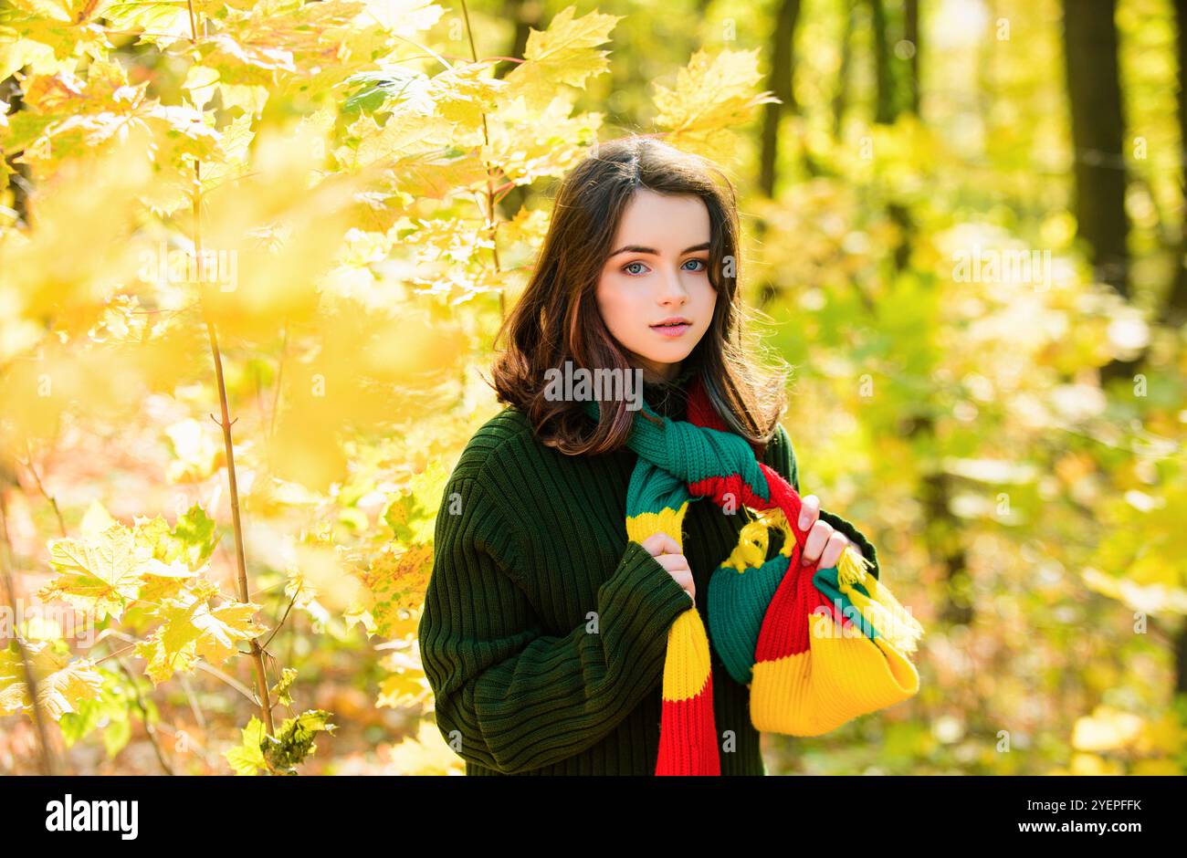 Teenage girl having fun in fall park outdoors Stock Photo - Alamy