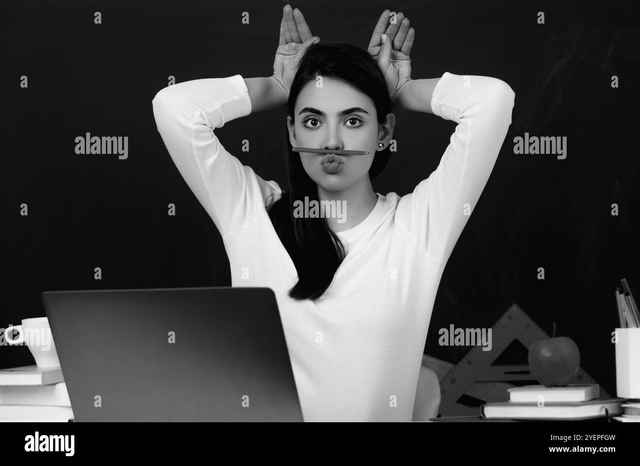 Crazy student having fun in classroom concept. Funny face of student or ...