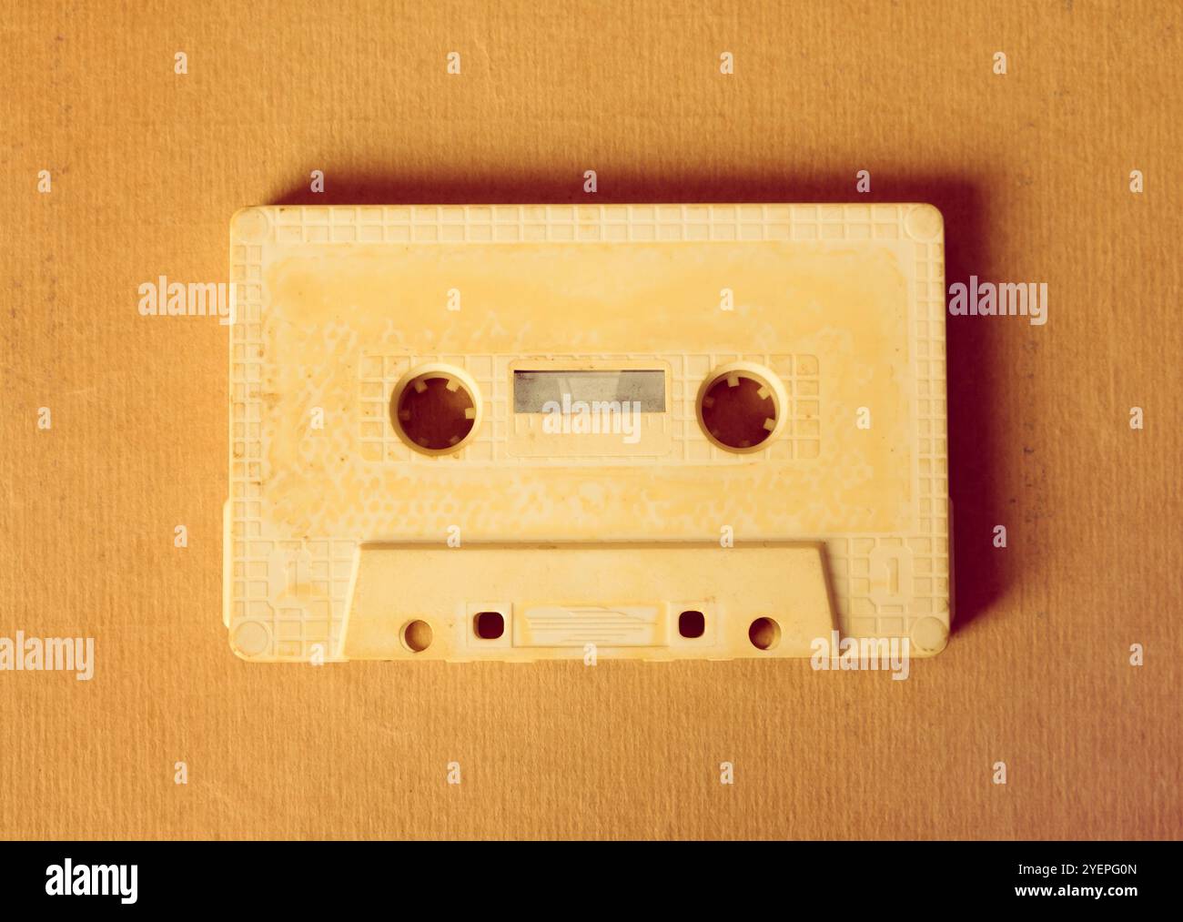 Old Audio Tape Cassette on the Vintage Paper Background closeup Stock ...