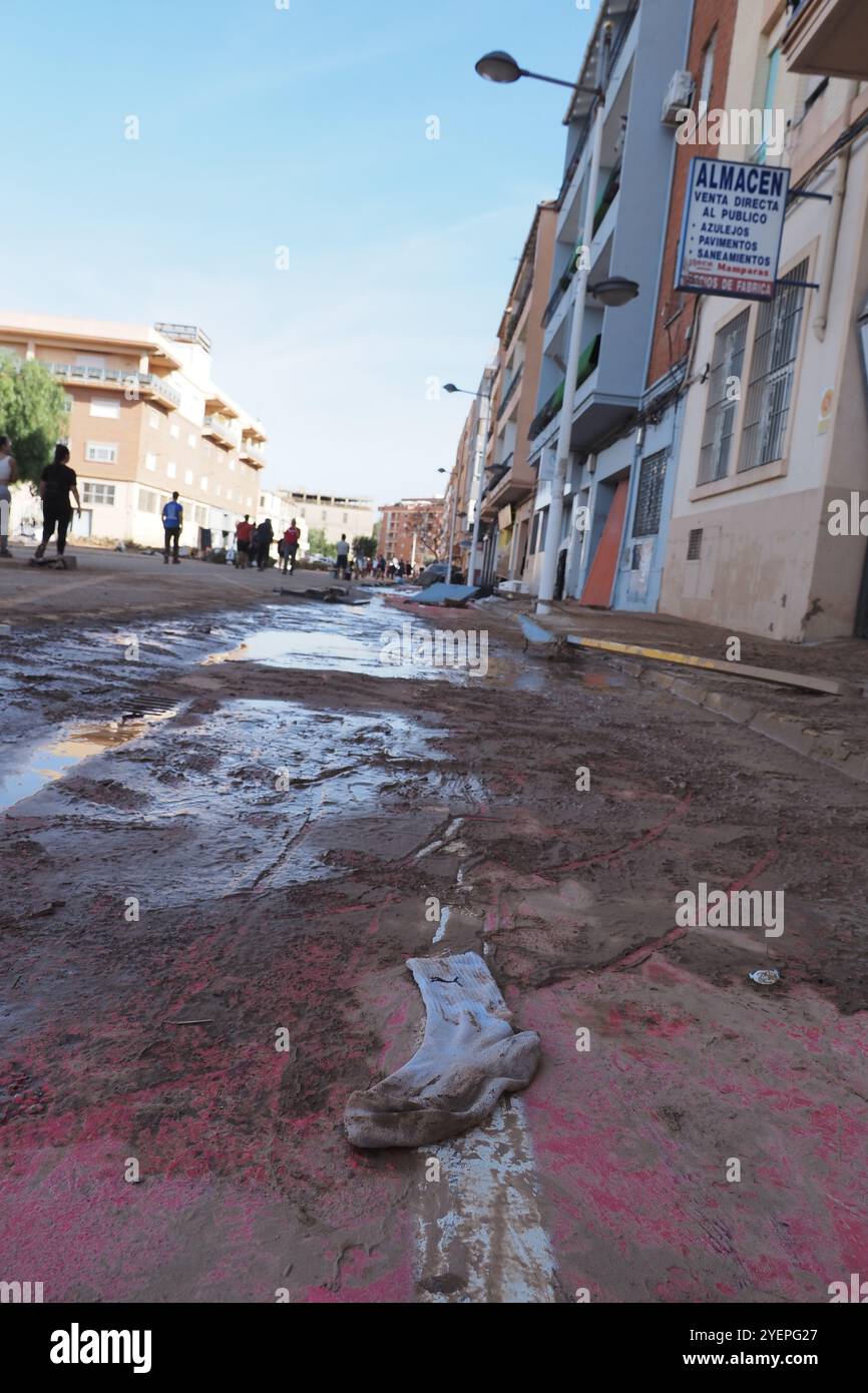 The aftermath of hurricane Dana in Valencia, Spain - Lost sock lying on ...