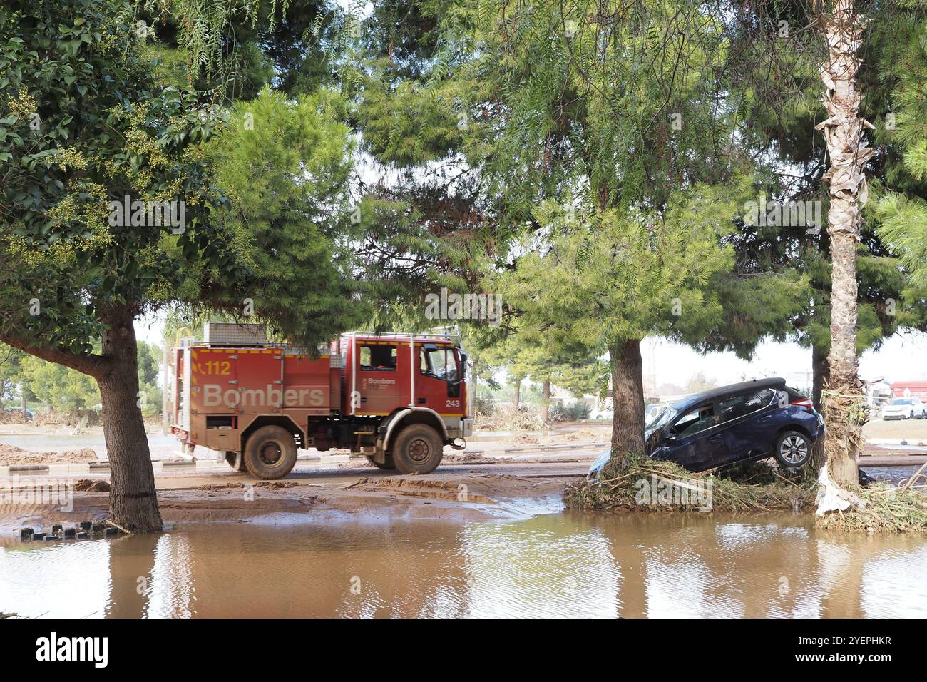 The aftermath of hurricane Dana in Valencia, Spain - Fire truck passing ...