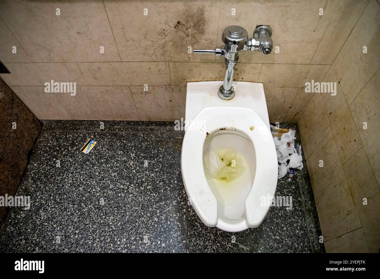 dirty public restroom toilet with visible grime on the bowl and floor ...