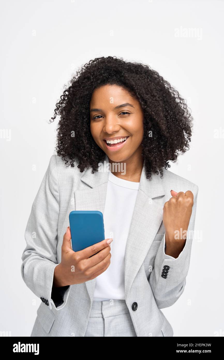 Happy African American business woman winner isolated on white using ...