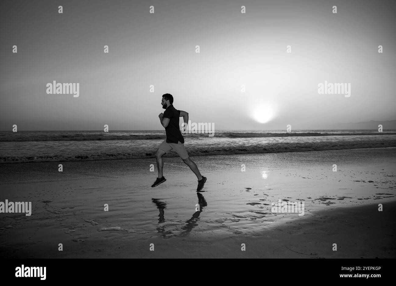 Man running on tropical beach at sunset. Full length of healthy man ...