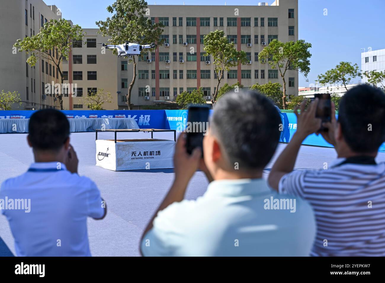 Drone delivery demonstration at the event. Guangzhou,China.31st October ...