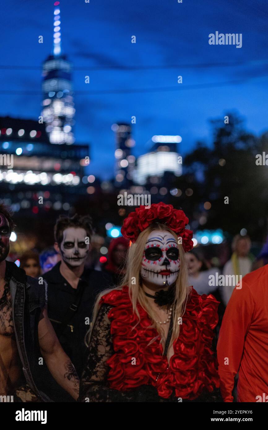 New York, United States. 31st Oct, 2024. Costumed parade goers march ...