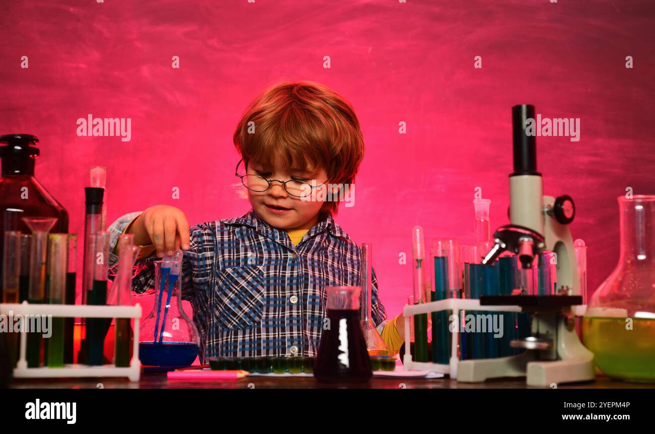Child in the class room with blackboard on background. schoolboy. They ...