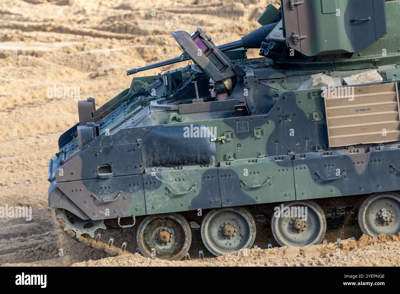 The vehicle in the photo is indeed an M2 Bradley, a U.S. military ...