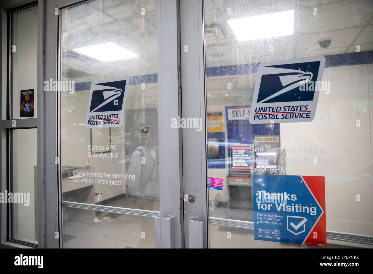 This image shows the entrance of a United States Postal Service (USPS ...