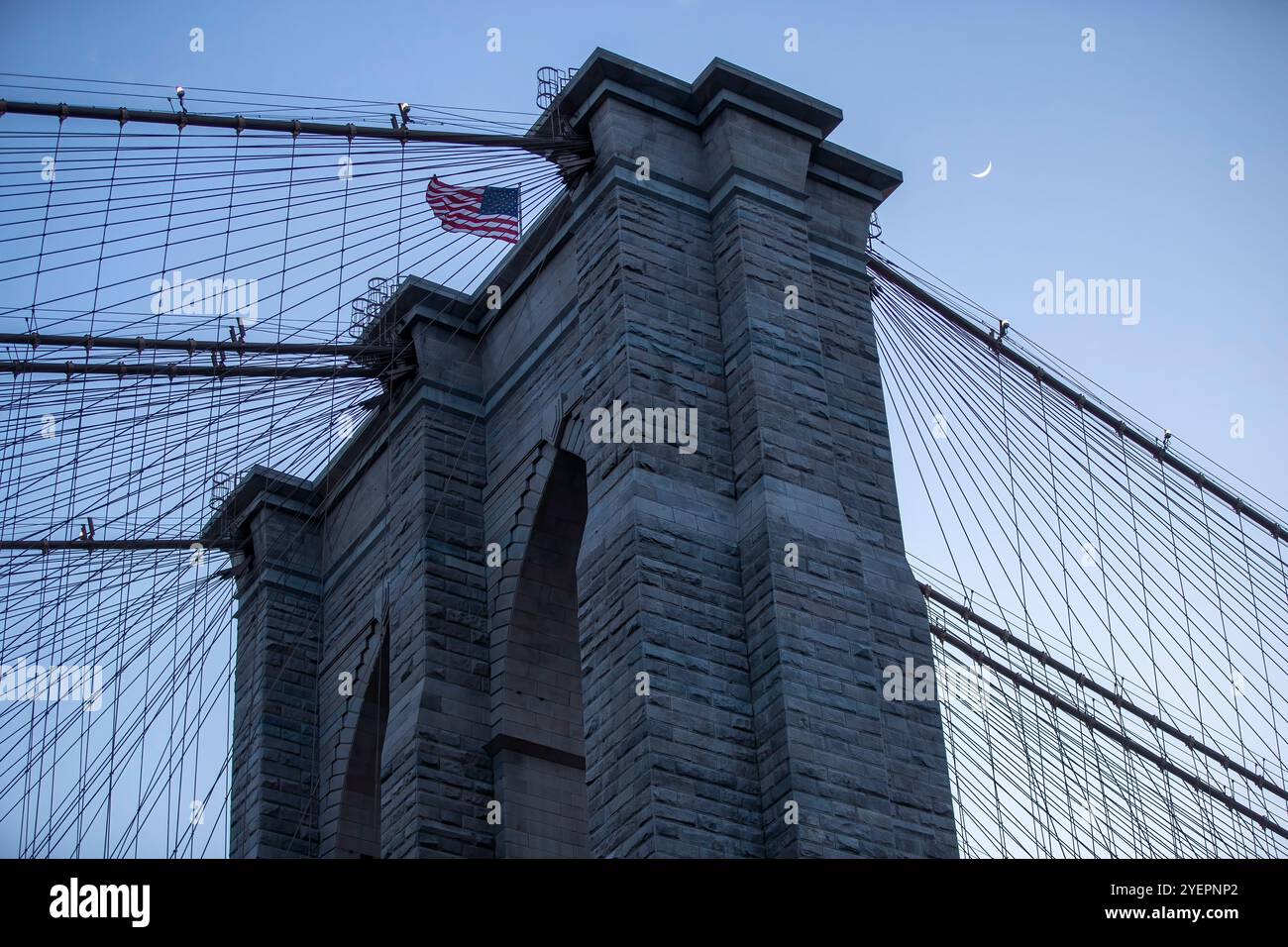 Close-up photograph of the Brooklyn Bridge tower, highlighting its ...