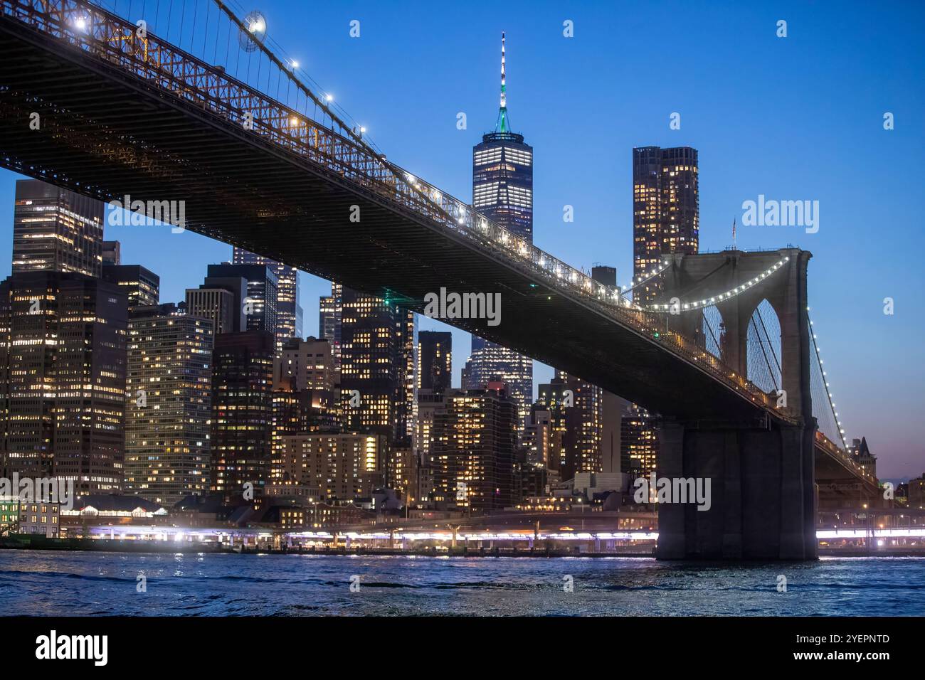 This image presents a sharp and clear view of the Brooklyn Bridge and ...