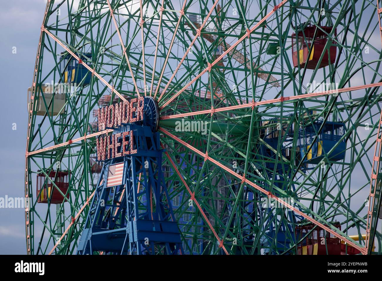 This image features a close-up view of the famous "Wonder Wheel" Ferris ...