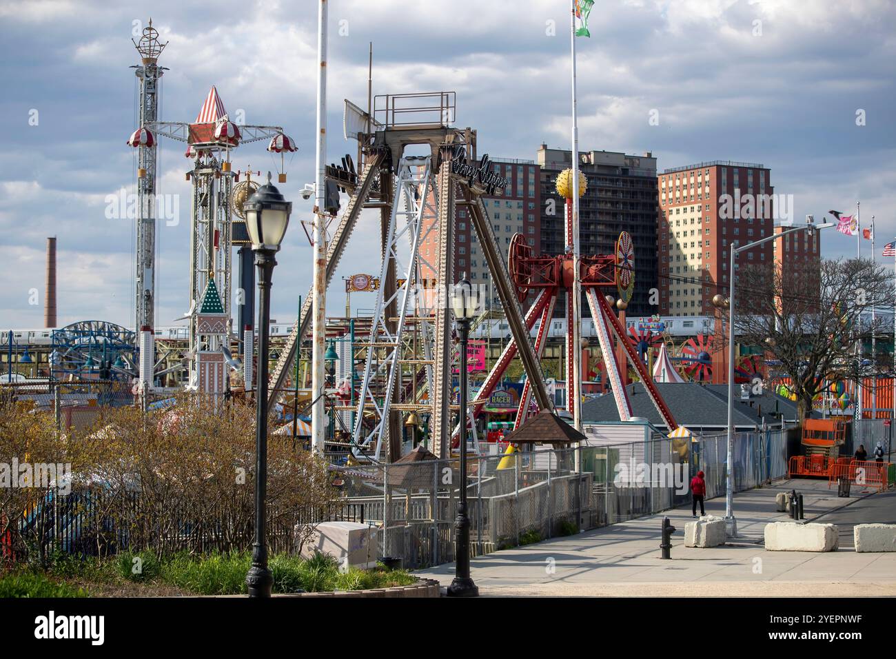 The photo captures a busy section of Coney Island’s amusement park ...