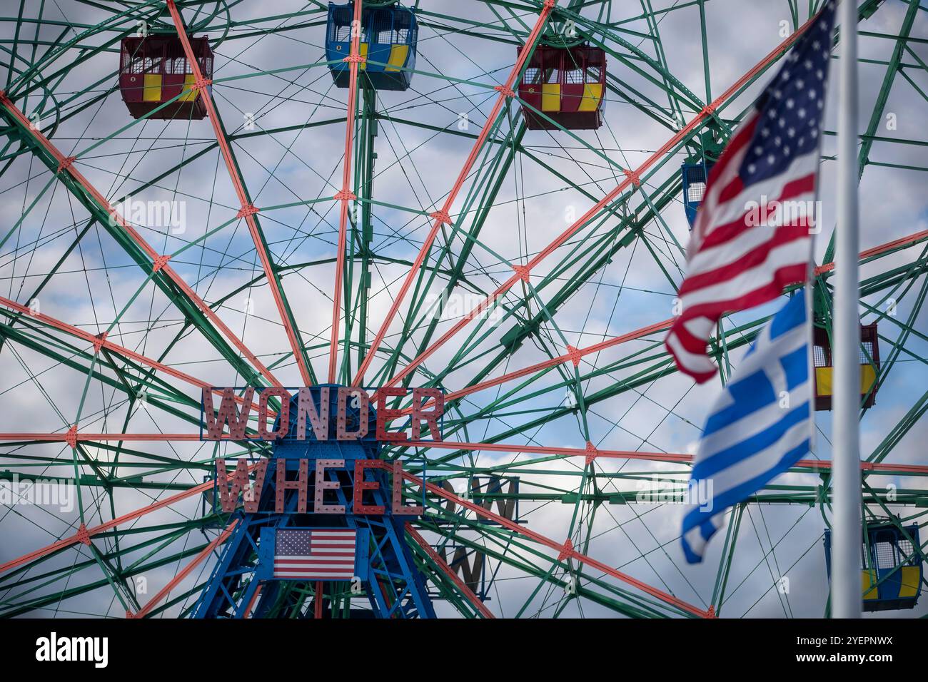 This photo features the iconic Wonder Wheel at Coney Island, with its ...