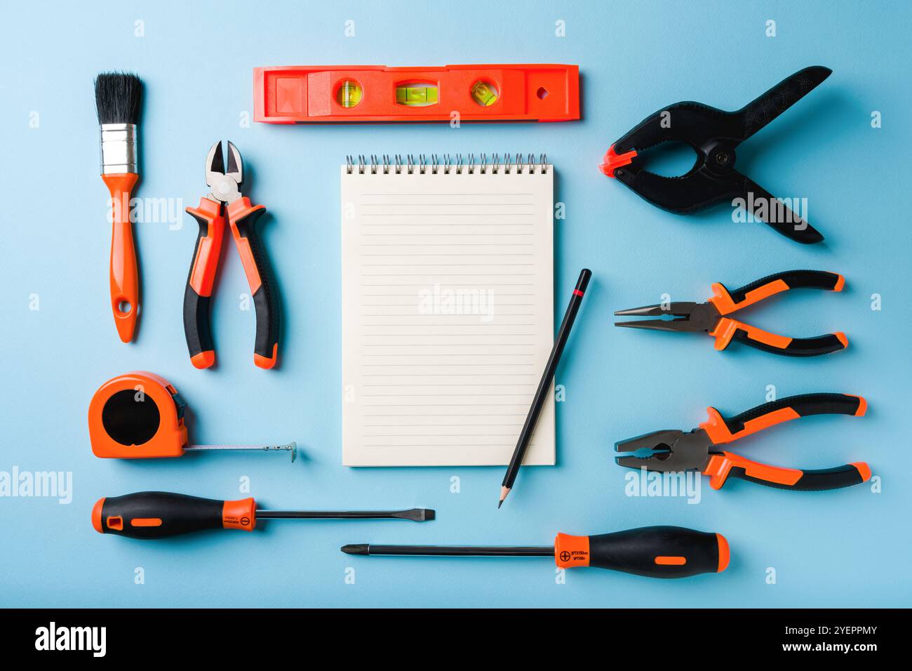 Handled tools or construction tools on blue background with blank ...