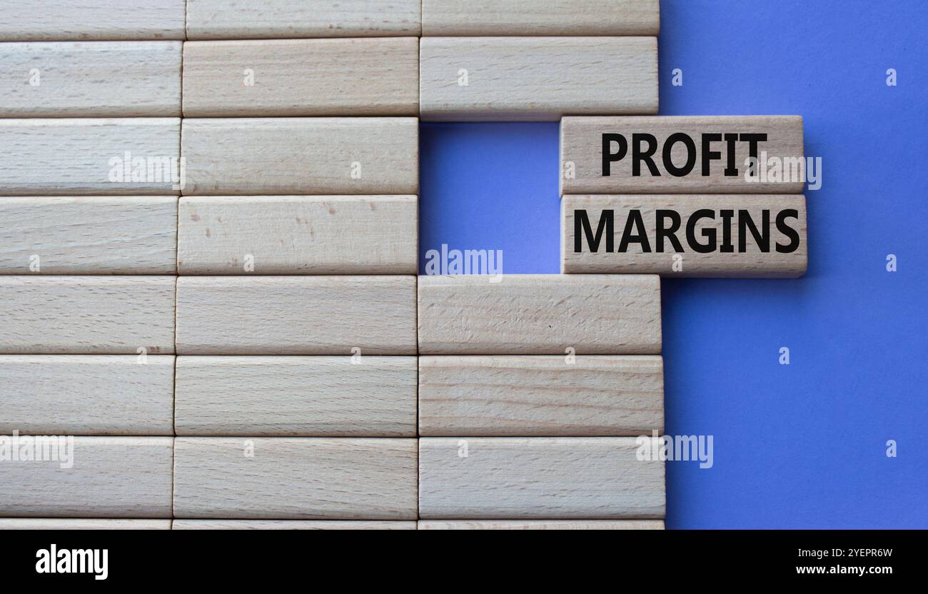 Profit Margins symbol. Concept word Profit Margins on wooden blocks ...