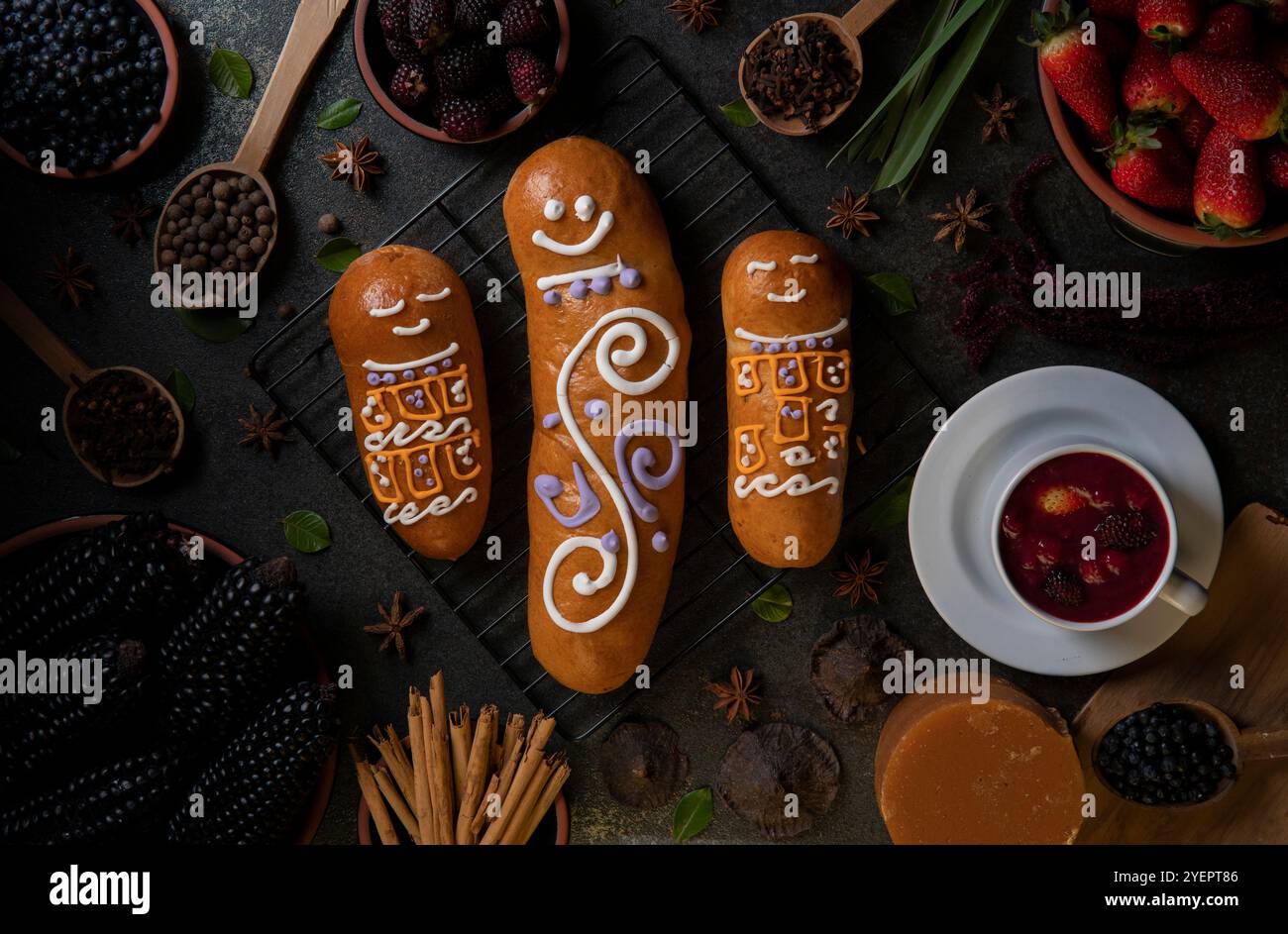 Guagua de pan and colada morada, traditional Ecuadorian food Stock ...