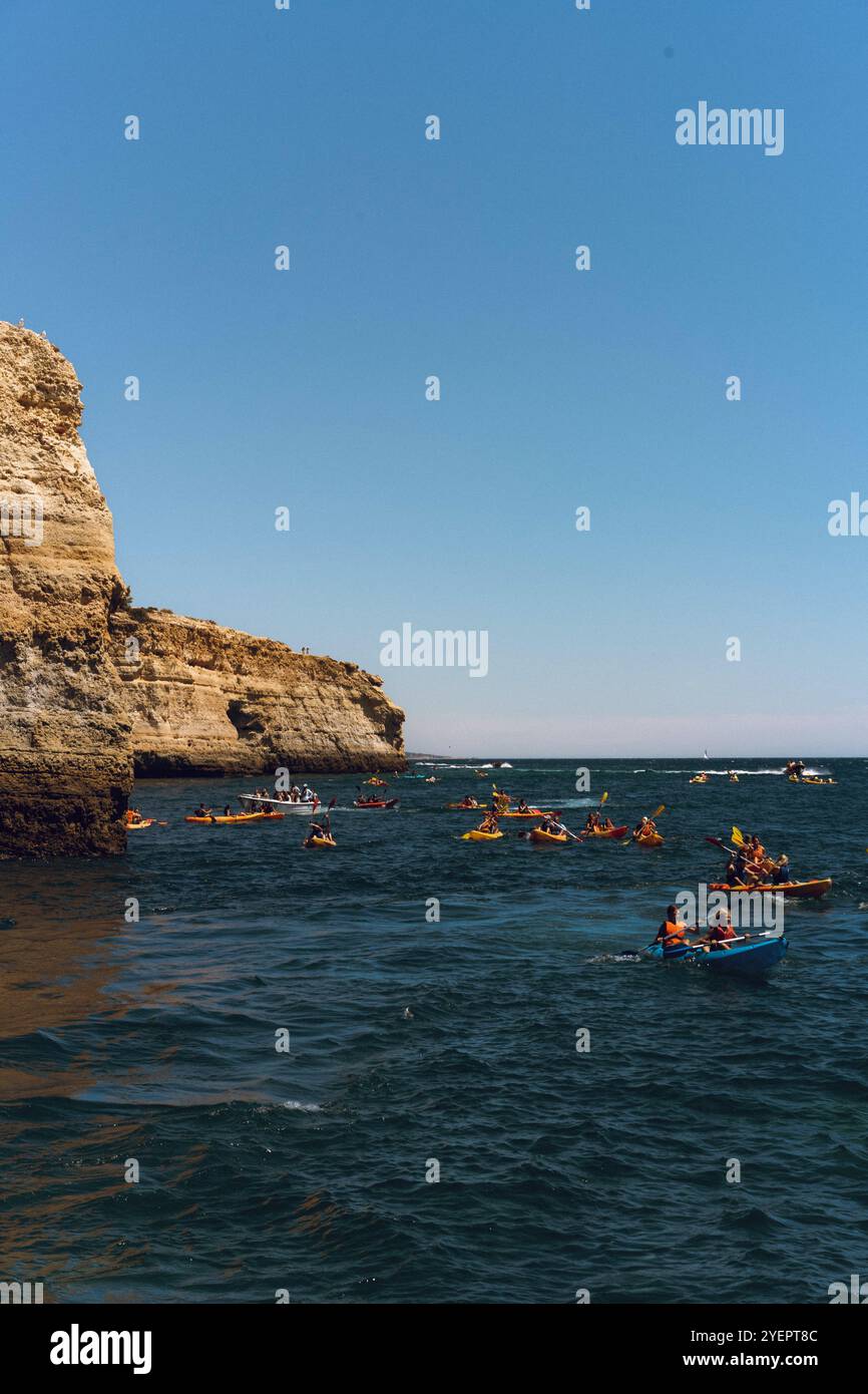 Tourists kayaking in the sea, south of Portugal Stock Photo - Alamy