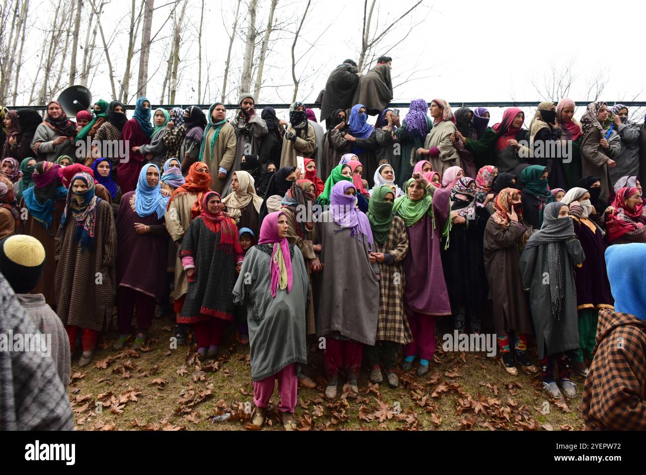 Thousands of mourners carry the body of alleged rebels Mudasir Parray, 14, and Mudasir Parray ...