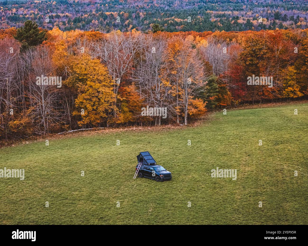 truck with roof top tent at campsite in Maine with fall foliage Stock ...