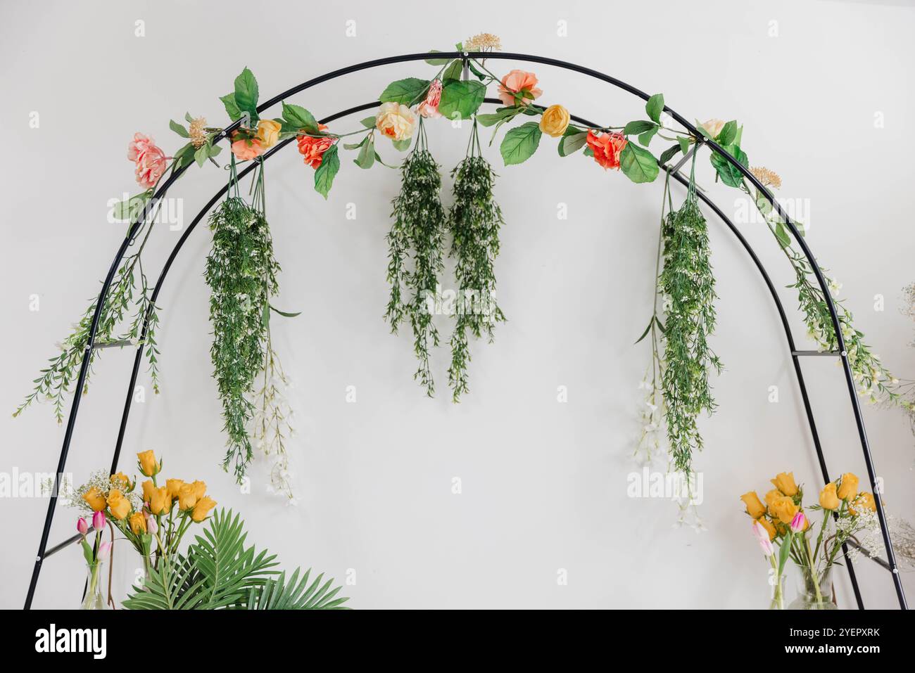Garden Arch with Floral Decorations Stock Photo - Alamy