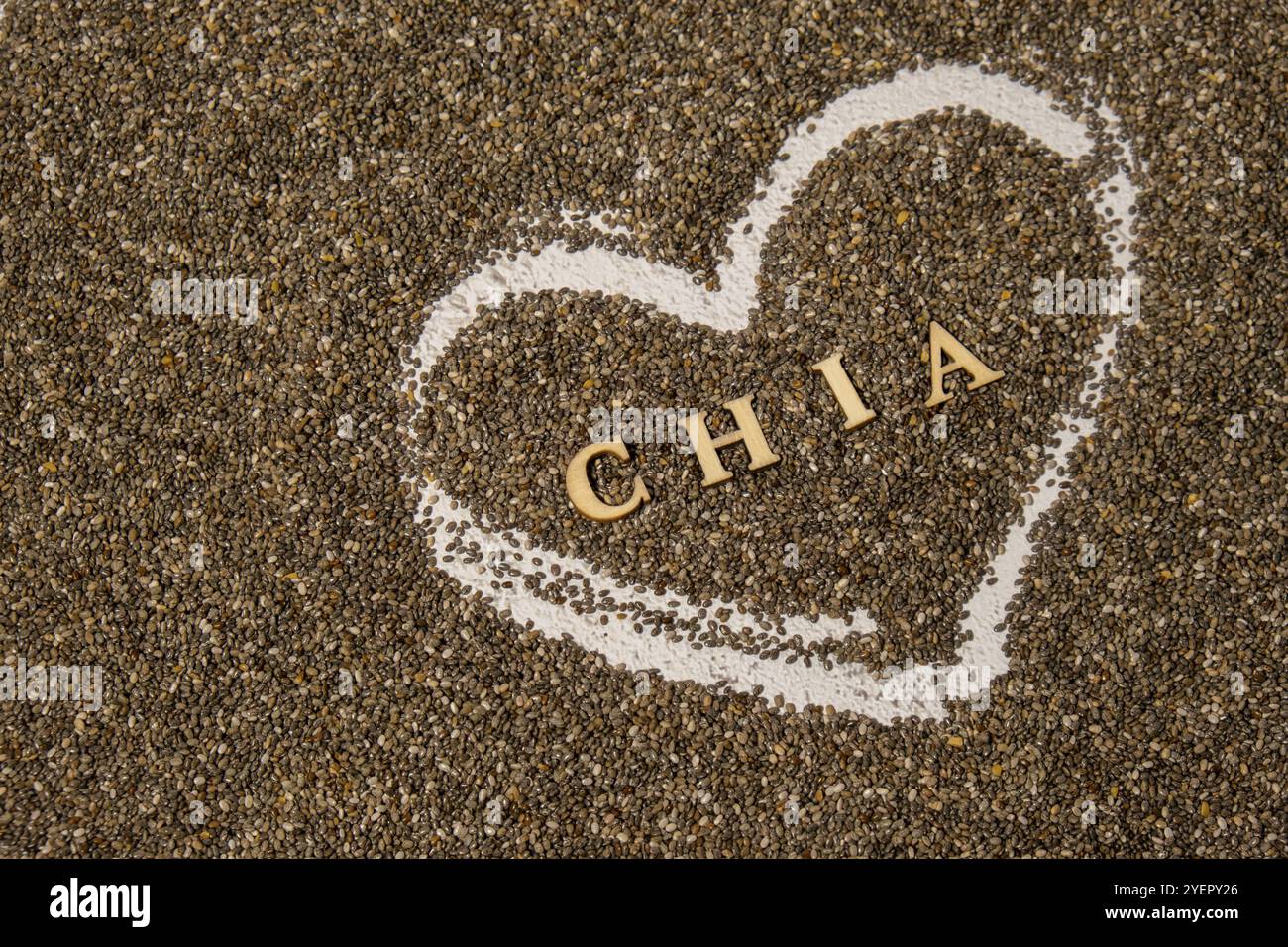 Heart made of chia seeds with word CHIA inside background. Healthy ...