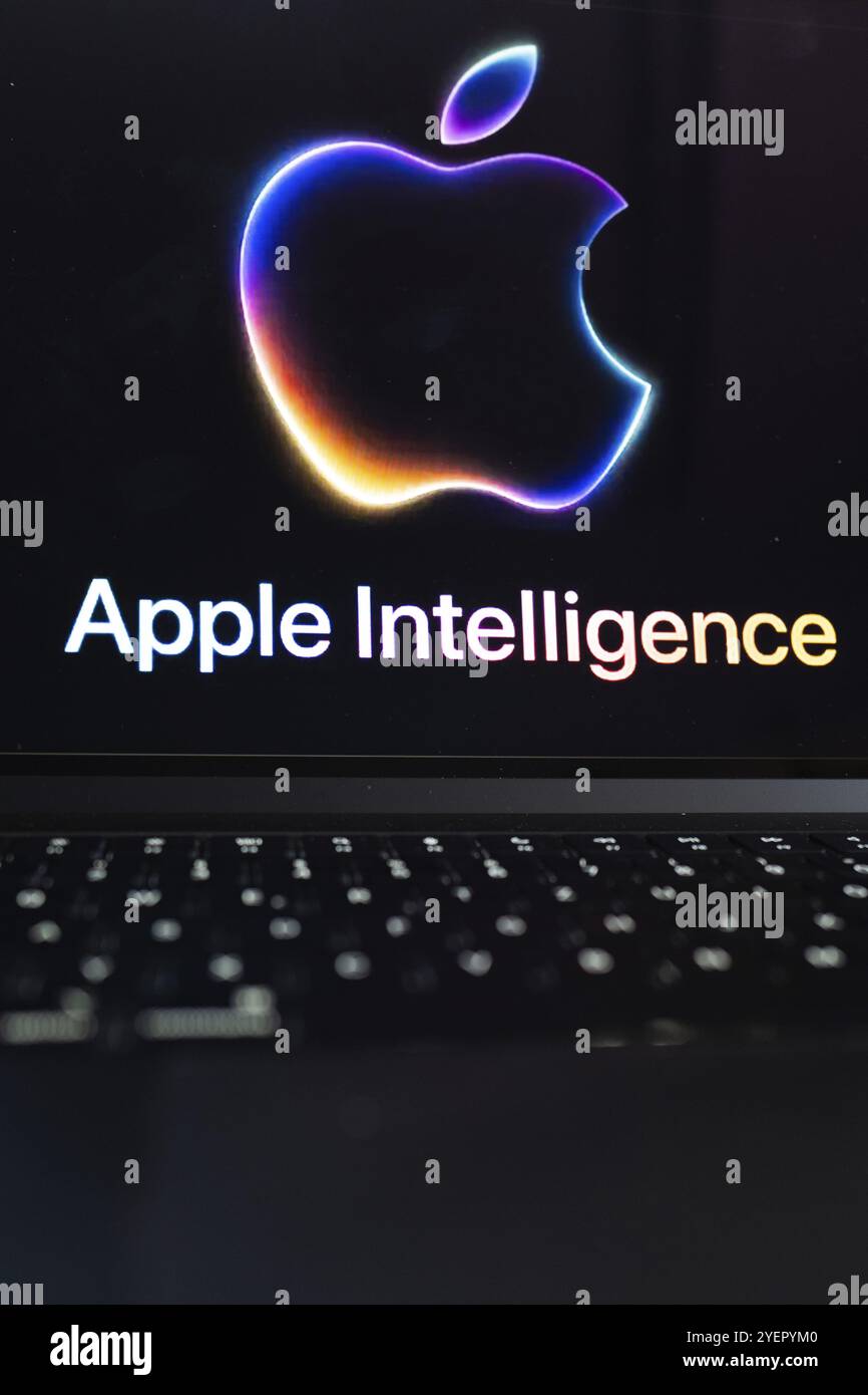 Apple logo in bright neon colours on a Macbook with illuminated ...