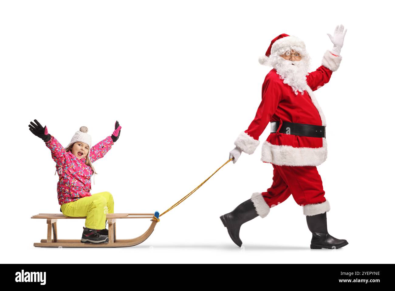 Santa Claus pulling a girl on a wooden sled and waving isolated on ...