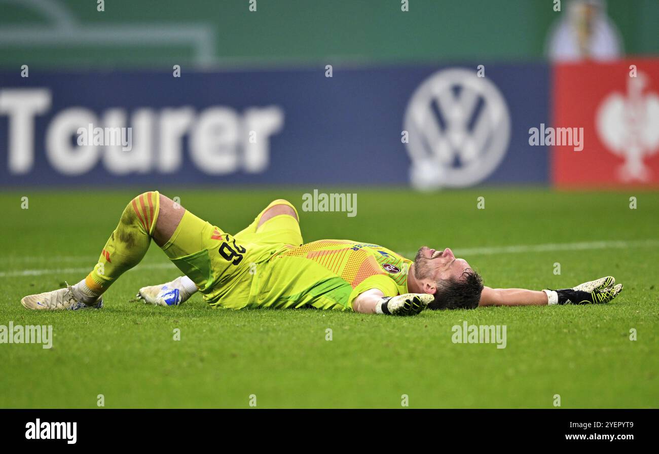 Goalkeeper Christian Mathenia 1. FC Nuernberg FCN (24) lies ...