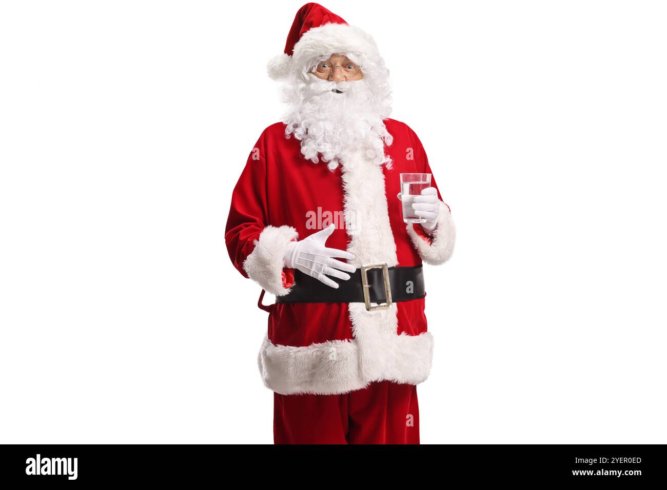 Santa claus drinking a glass of water isolated on white background ...