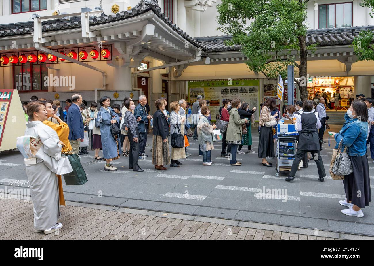 Queue of Japanese buying tickets outside the Kabukiza Theatre for ...
