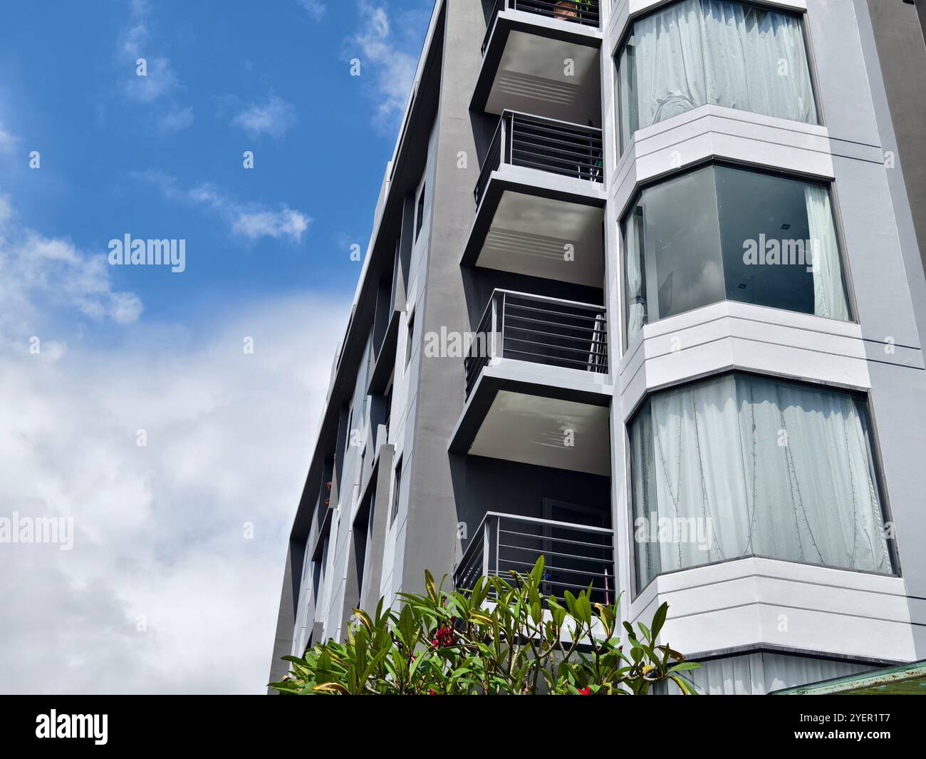 Detailed view of windows, doors and balconies of city buildings Stock ...