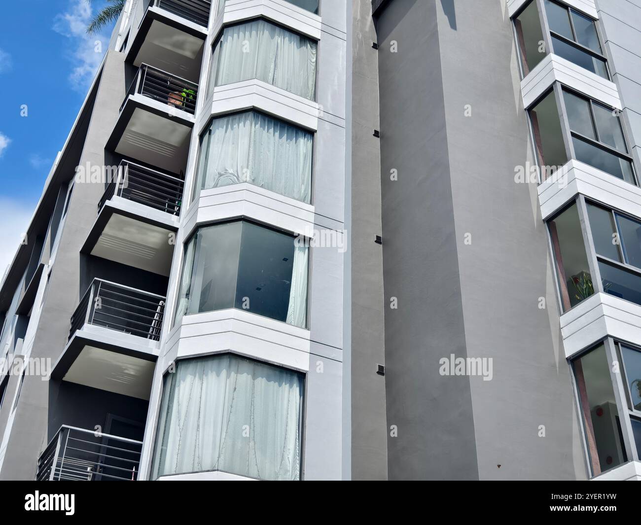 Detailed view of windows, doors and balconies of city buildings Stock ...