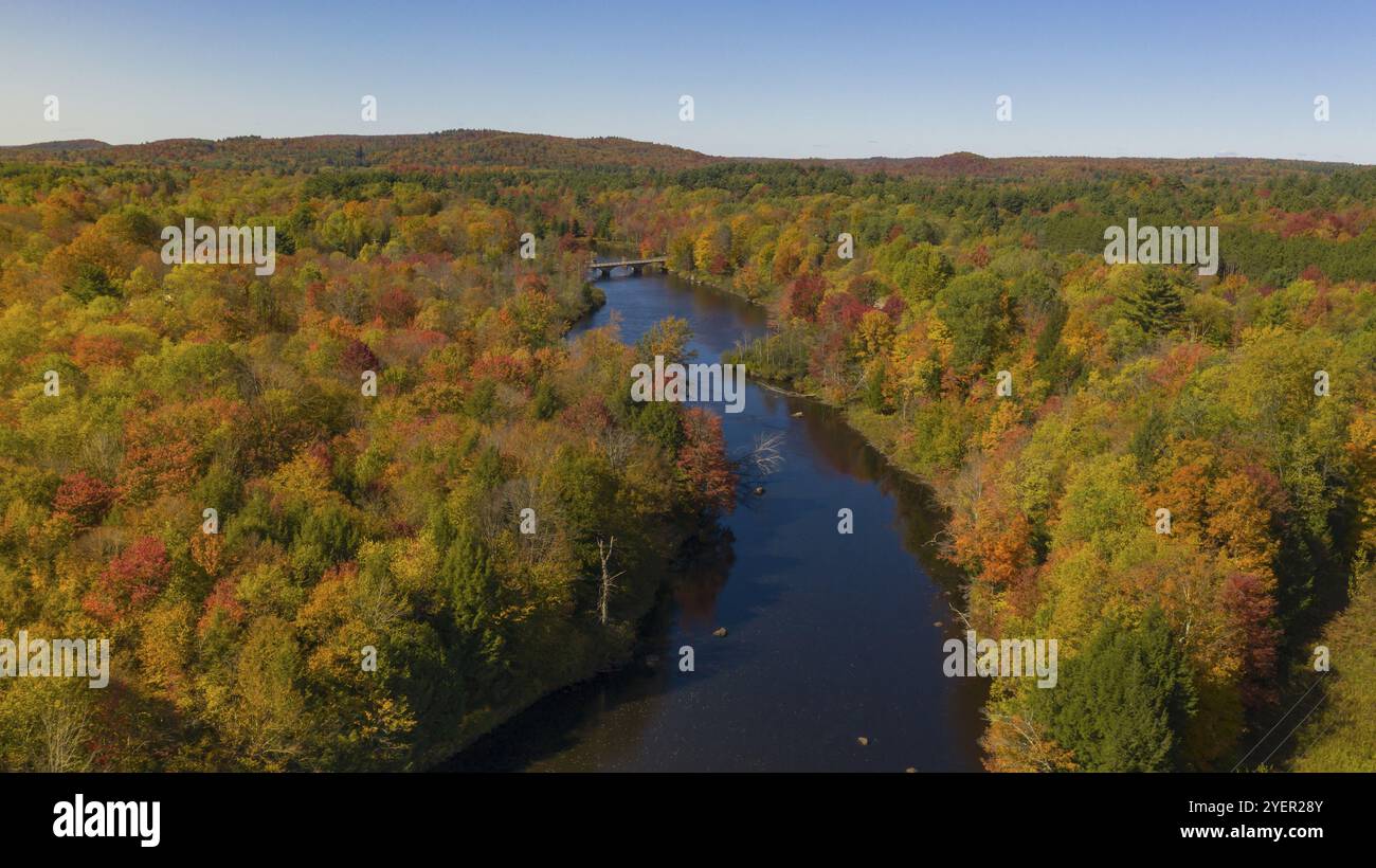 Fall color is more saturated at sunset over the Oswegatche River ...
