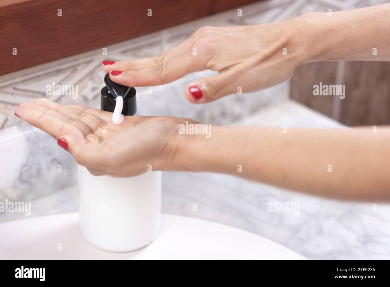 Female hands liquid soap hi-res stock photography and images - Alamy