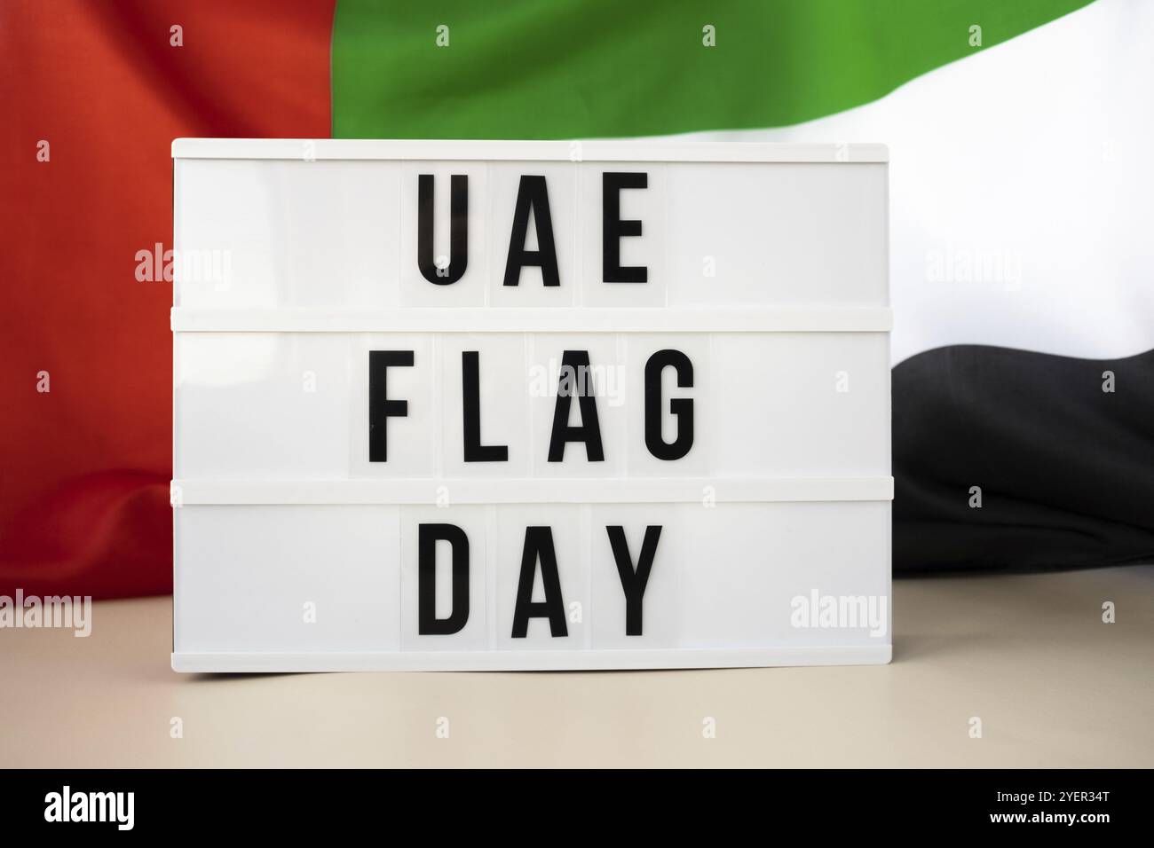 Person waving uae flag hi-res stock photography and images - Alamy