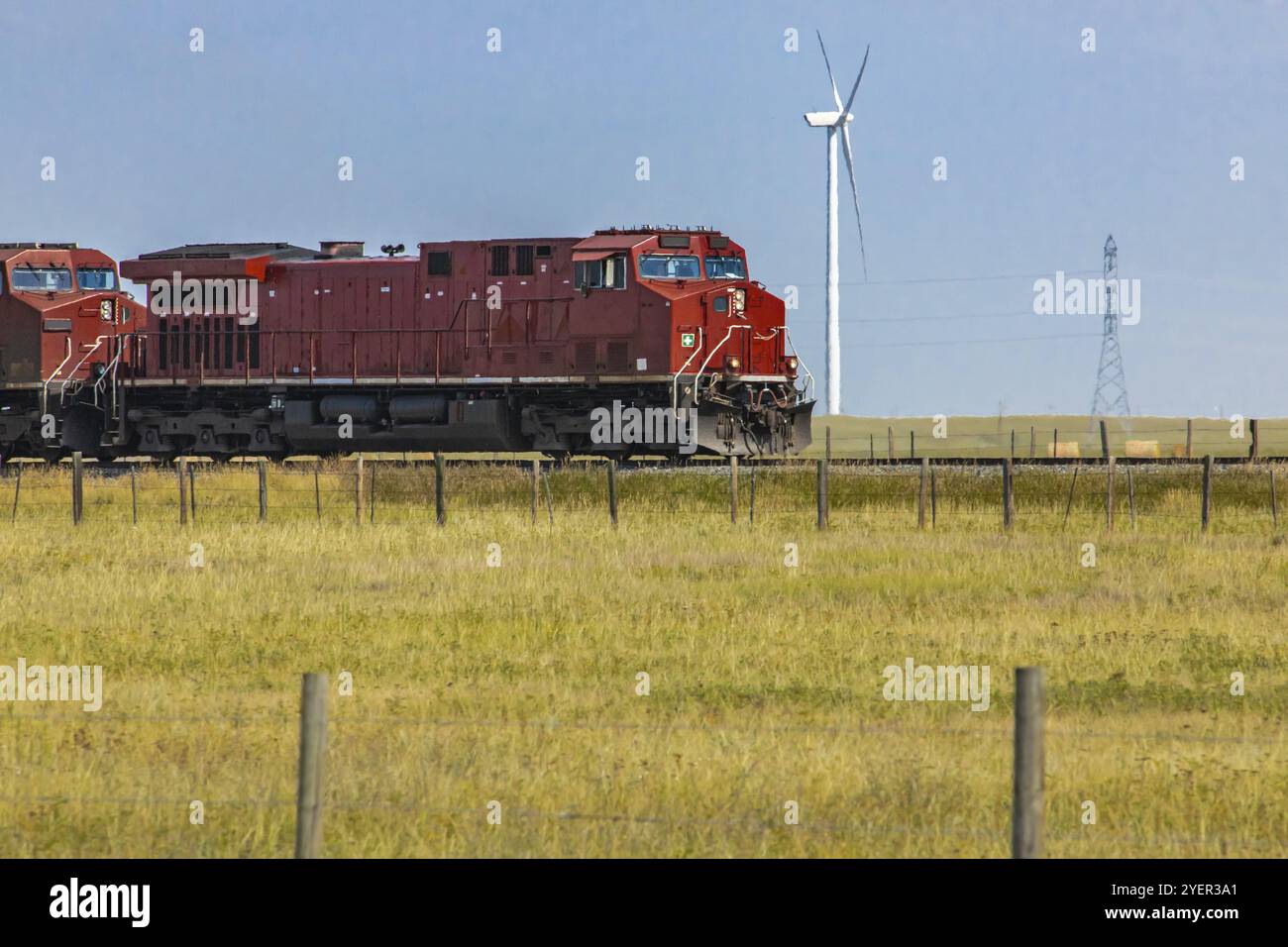 Wide angle shot of bright red vintage locomotive of a red Canadian ...