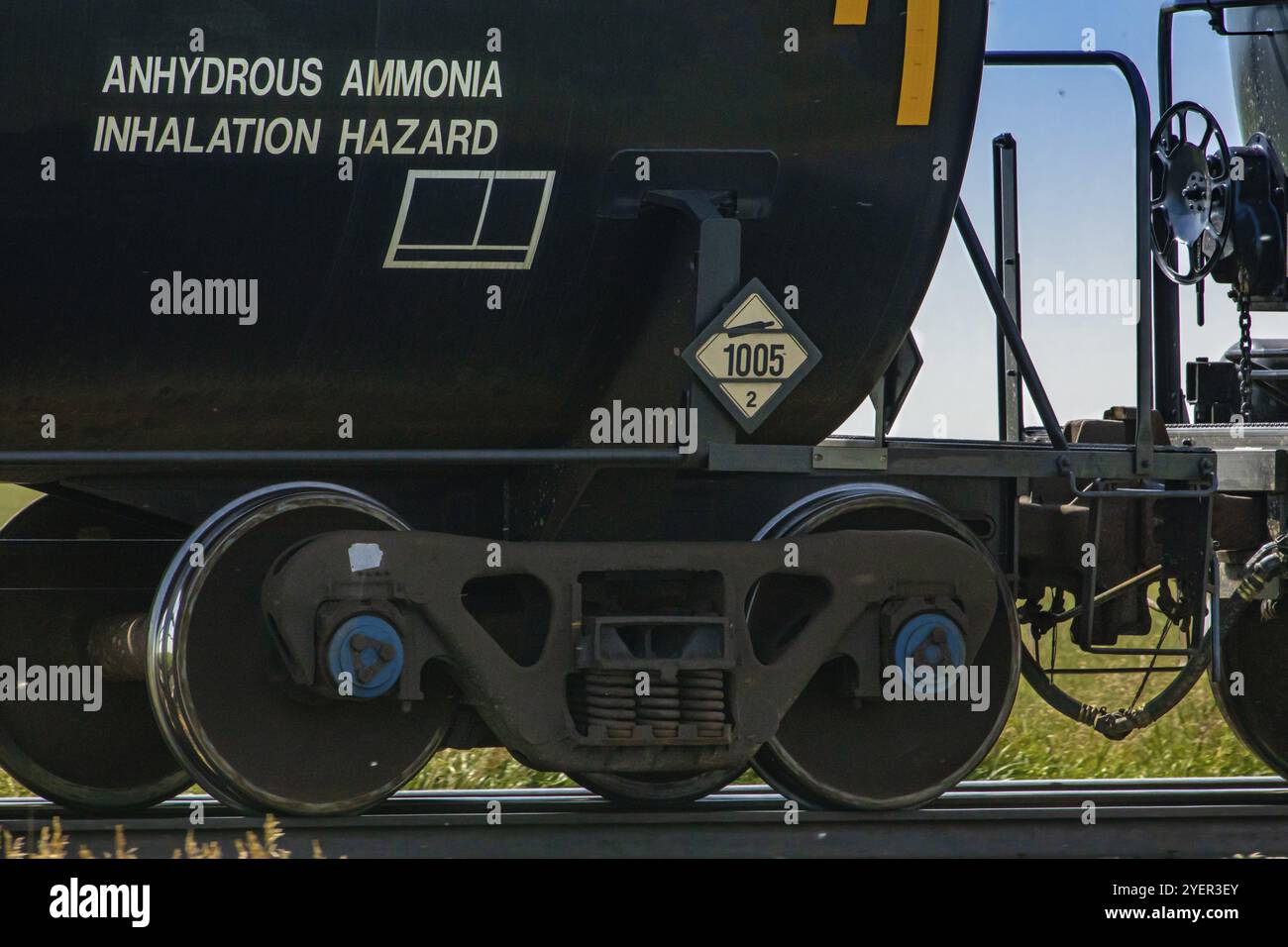 Close up of the tank car of a canadian freight train with 1005 warning ...