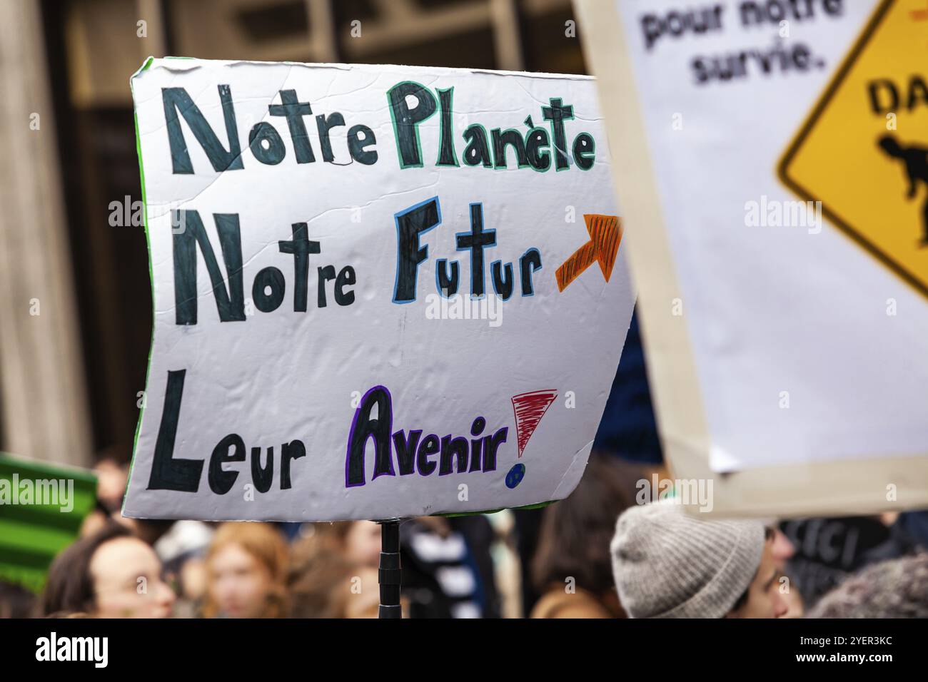 A French placard is viewed up close, saying our planet, our future ...