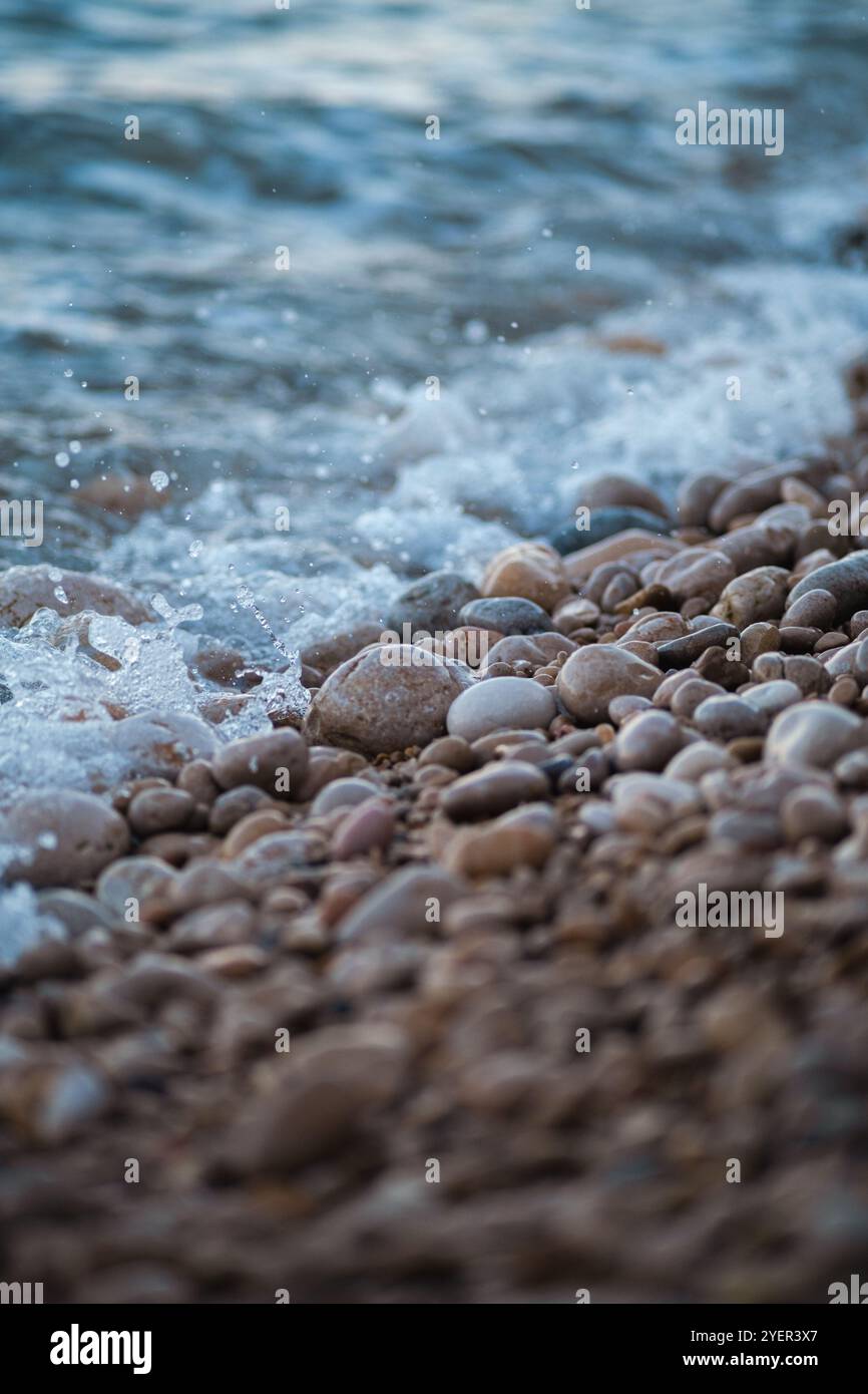 Small waves crashing on rocks hi-res stock photography and images - Alamy